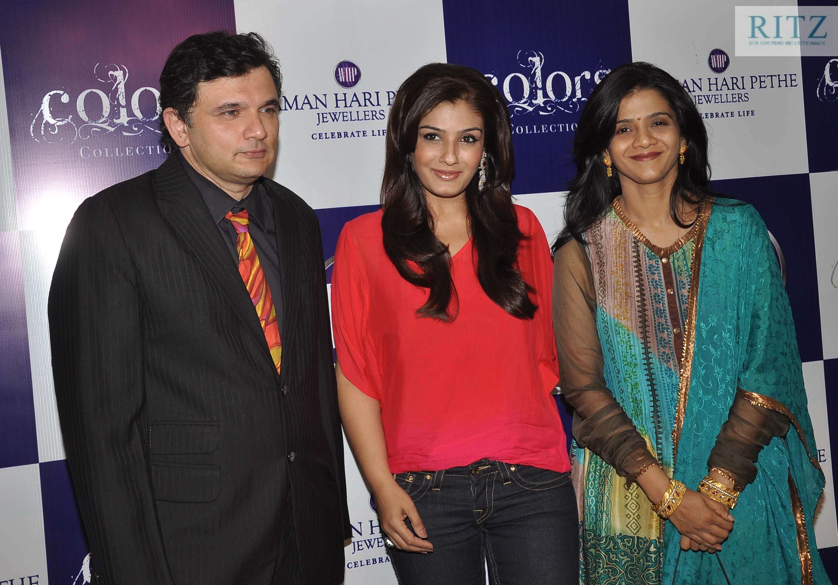 Mr. Aditya Pethe & Mrs. Sonali Pethe with Raveena Tandon while ...