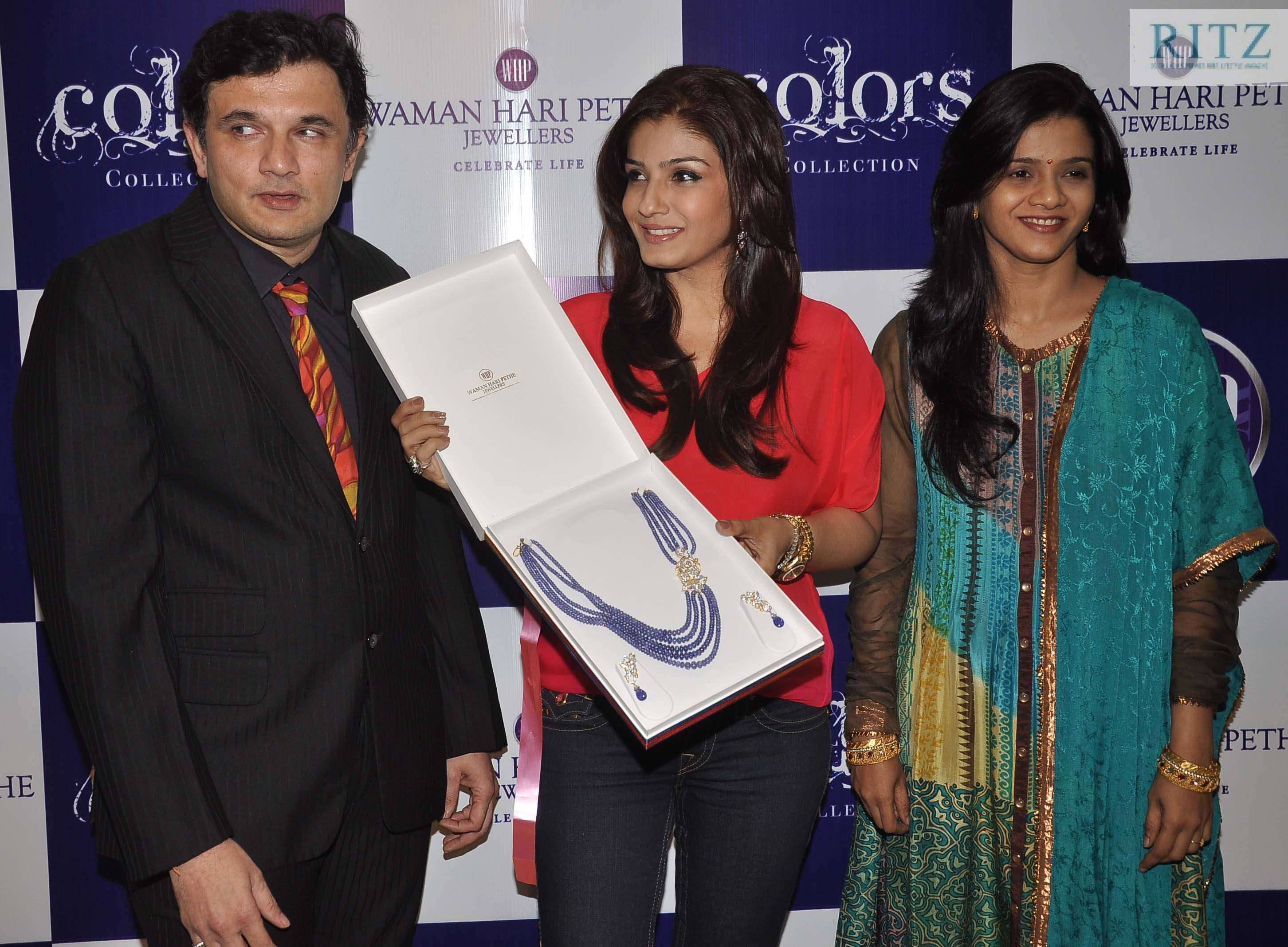 Mr. Aditya Pethe & Mrs. Sonali Pethe with Raveena Tandon while ...