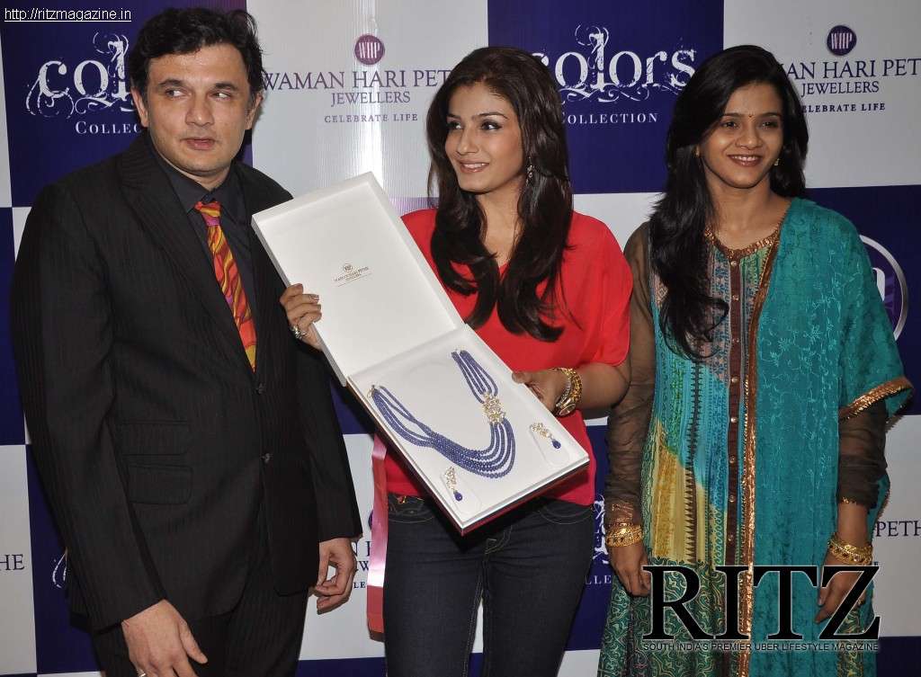 Mr. Aditya Pethe & Mrs. Sonali Pethe with Raveena Tandon while ...