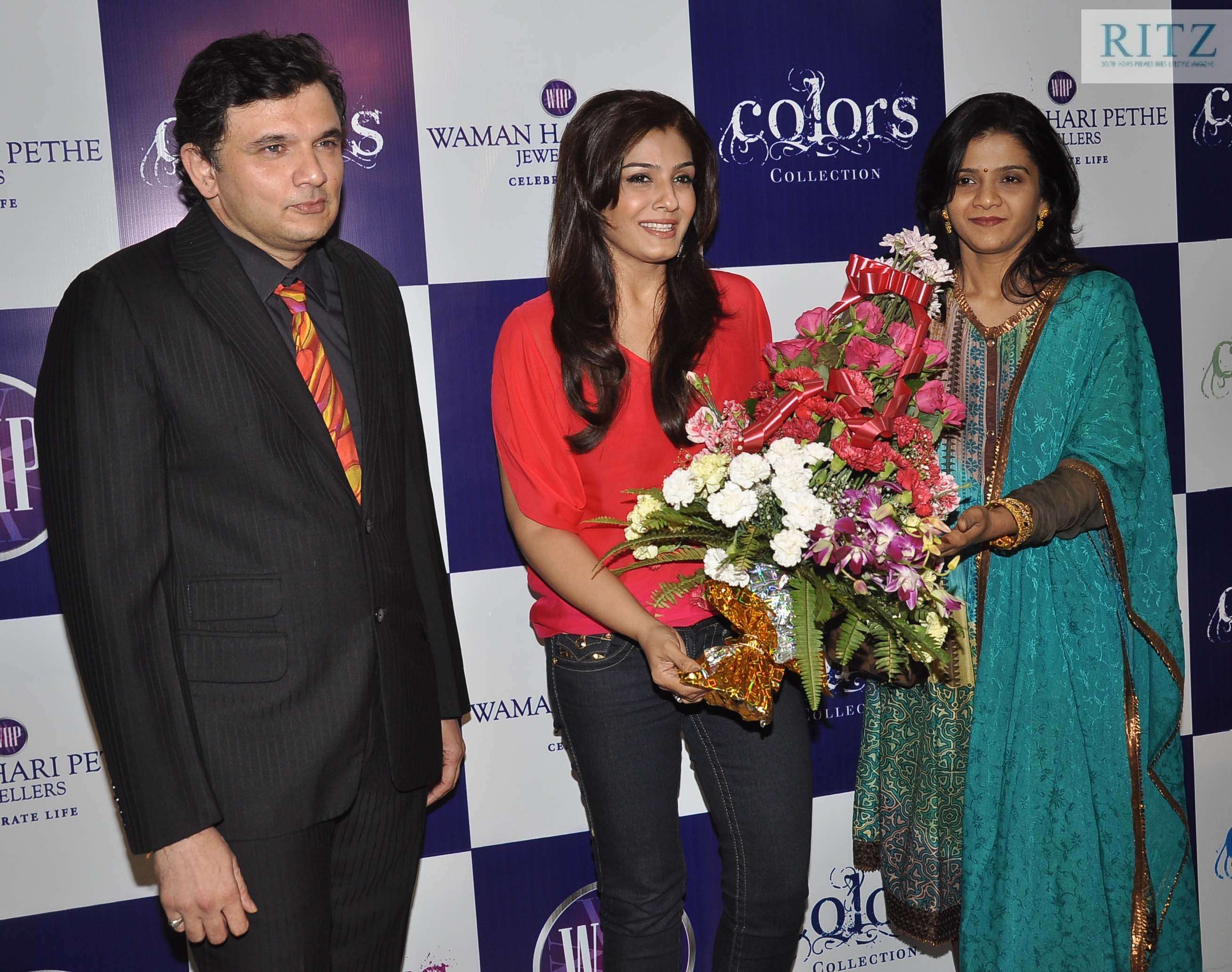 Mr. Aditya Pethe & Mrs. Sonali Pethe with Raveena Tandon while ...