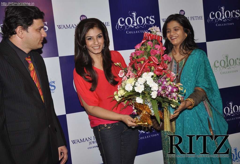Mr. Aditya Pethe & Mrs. Sonali Pethe with Raveena Tandon while ...