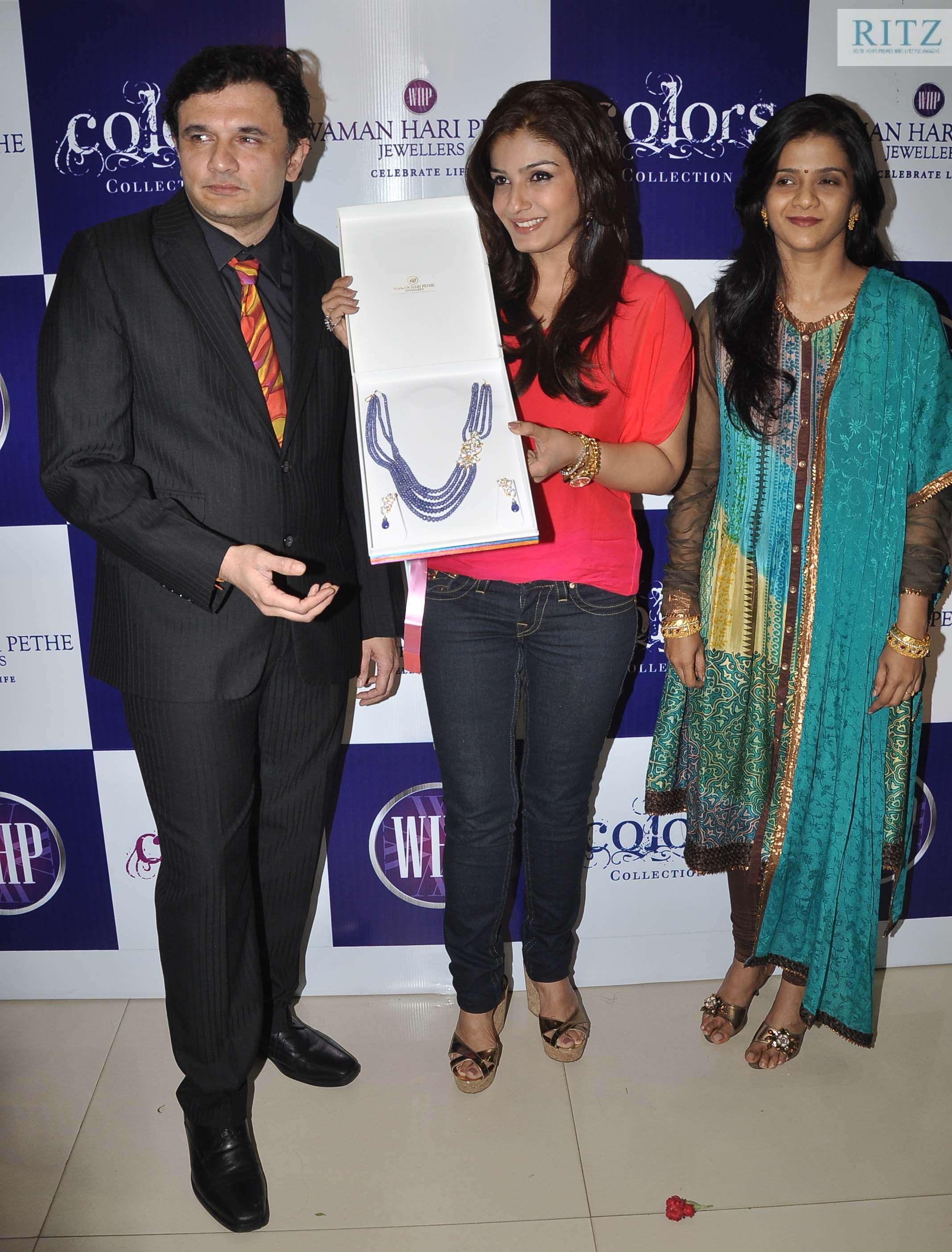Mr. Aditya Pethe & Mrs. Sonali Pethe with Raveena Tandon while ...