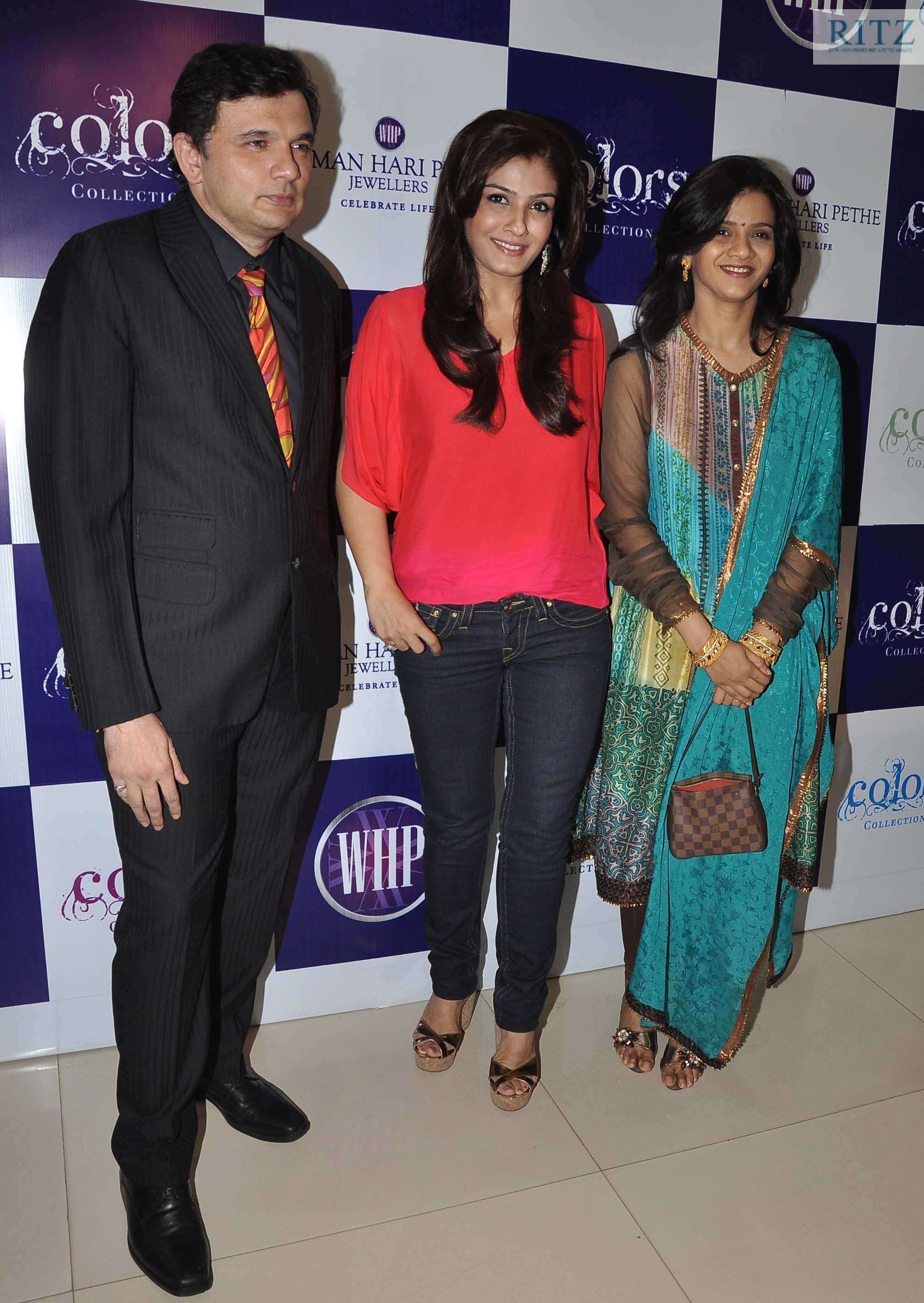 Mr. Aditya Pethe & Mrs. Sonali Pethe with Raveena Tandon while ...