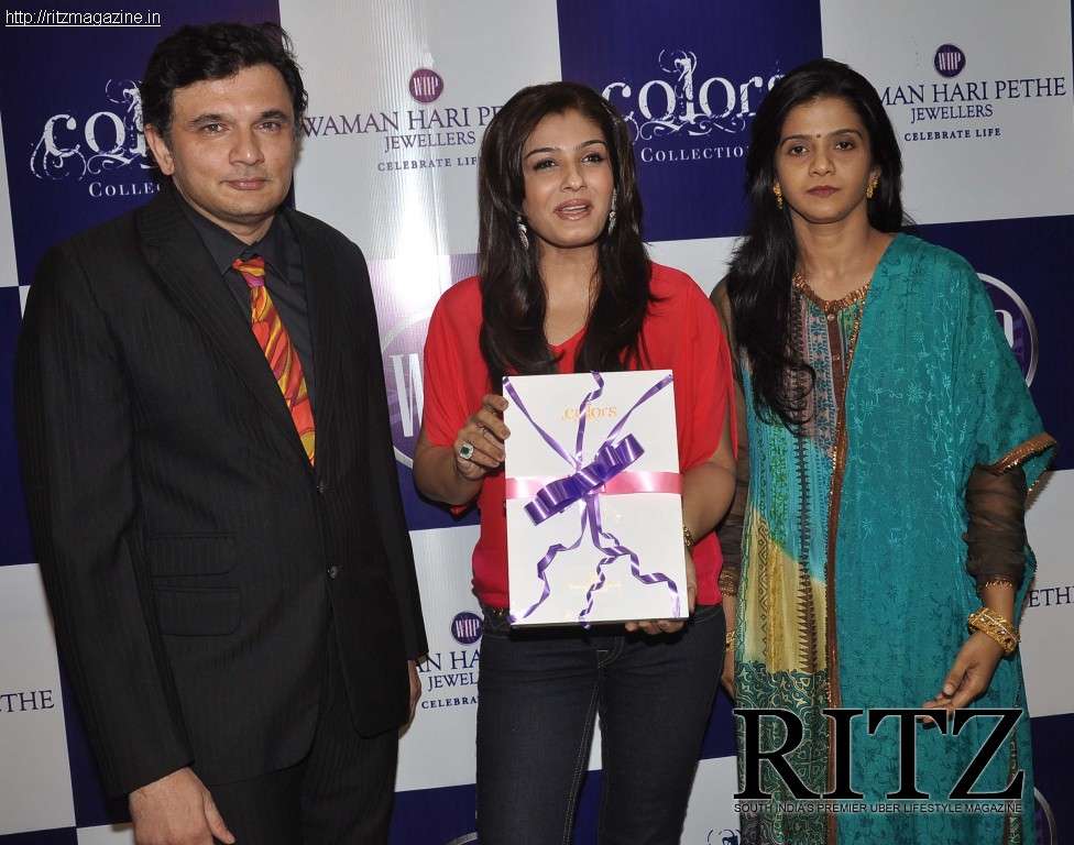 Mr. Aditya Pethe & Mrs. Sonali Pethe with Raveena Tandon while ...