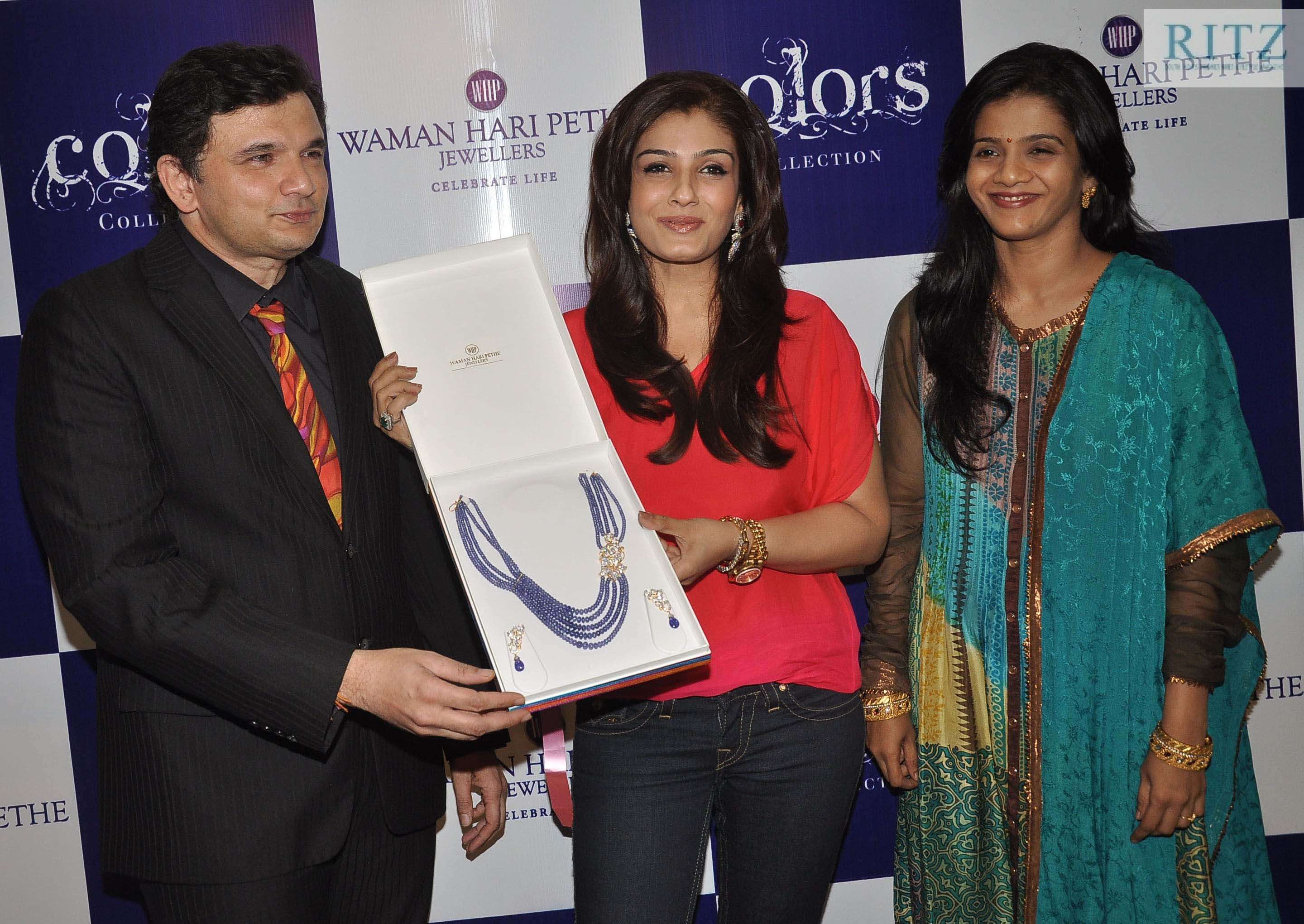 Mr. Aditya Pethe with Raveena Tandon while launching the Exclusive new ...