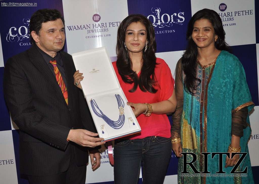 Mr. Aditya Pethe & Mrs. Sonali Pethe with Raveena Tandon while ...