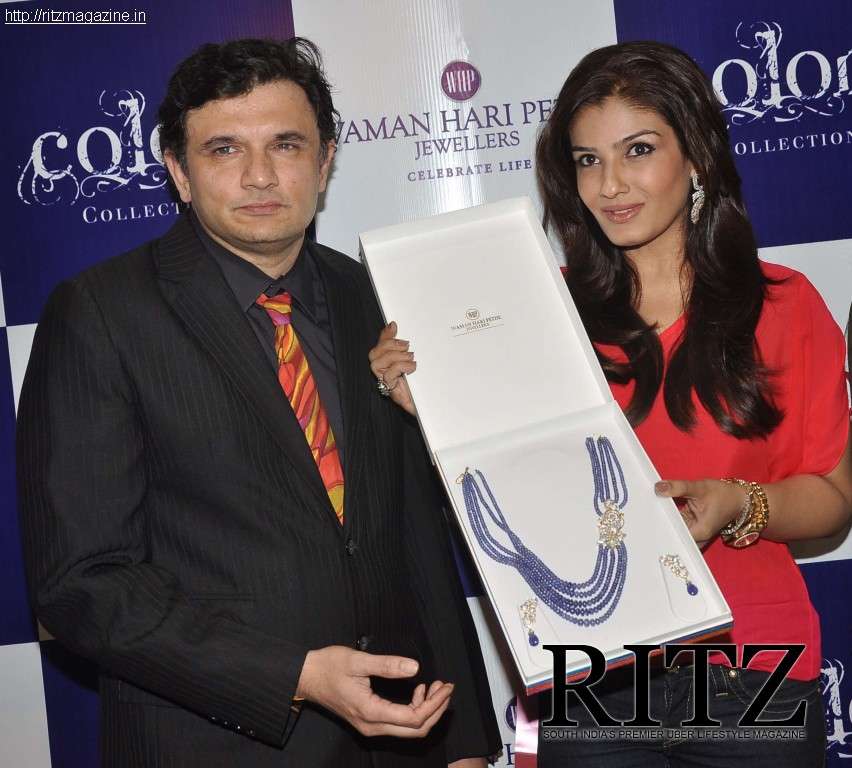 Mr. Aditya Pethe with Raveena Tandon while launching the Exclusive new ...