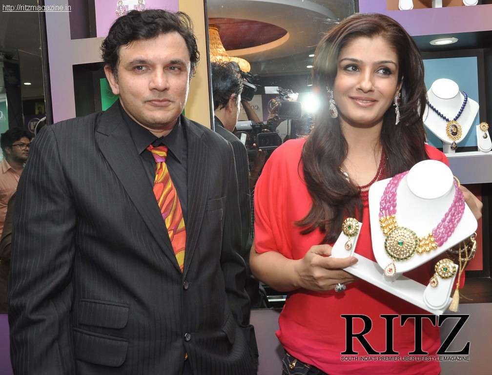 Mr. Aditya Pethe with Raveena Tandon while launching the Exclusive new ...