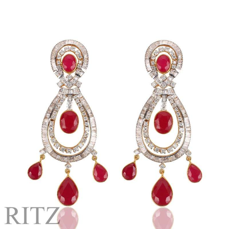 Bangles from Diagold made of pear shaped emerald and ruby | RITZ